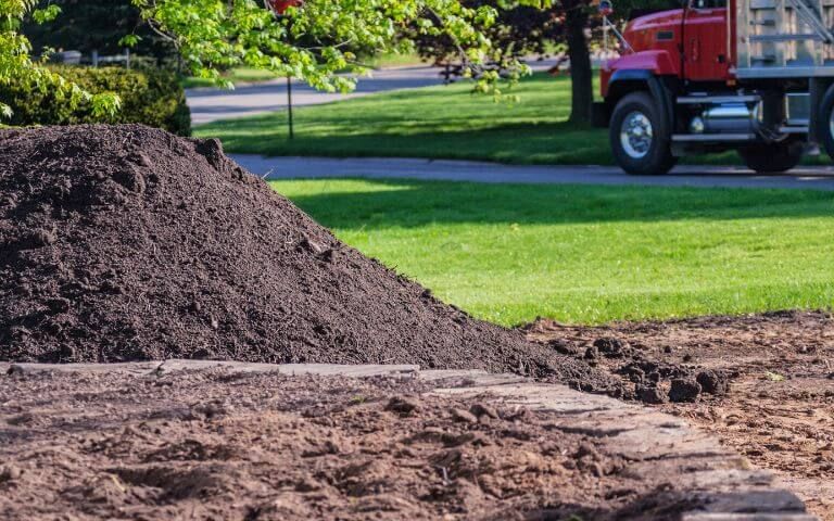 Bulk Top Soil Delivery - Hawkes Landscaping